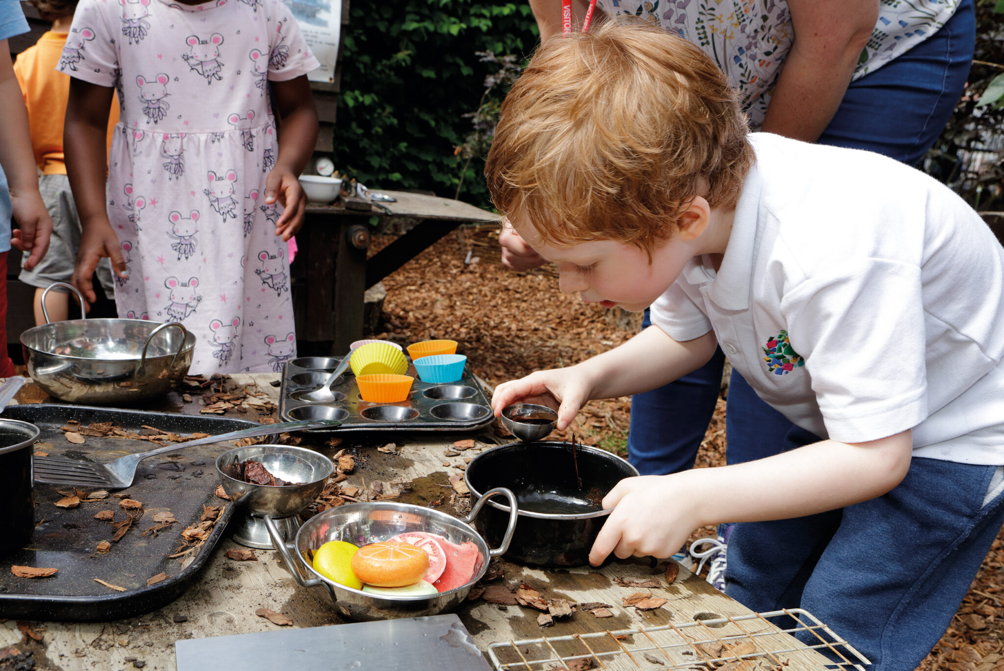 The Magic of Mud Kitchens in Early Years - Yellow Door