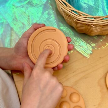 Sensory Stones - feel and talk about shapes and patterns