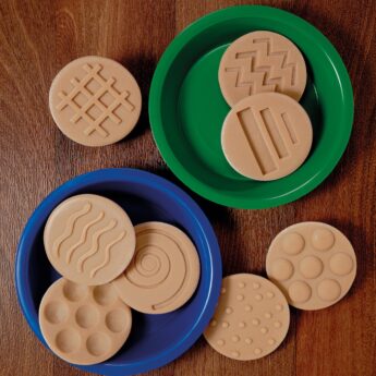 Sensory Stones - feel and talk about shapes and patterns